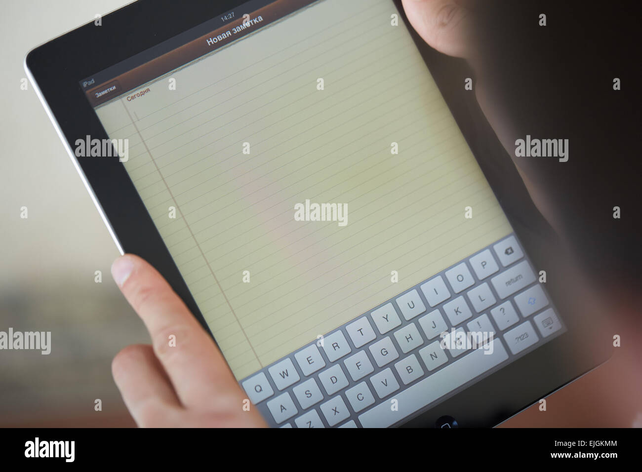 the tablet in hands Stock Photo - Alamy