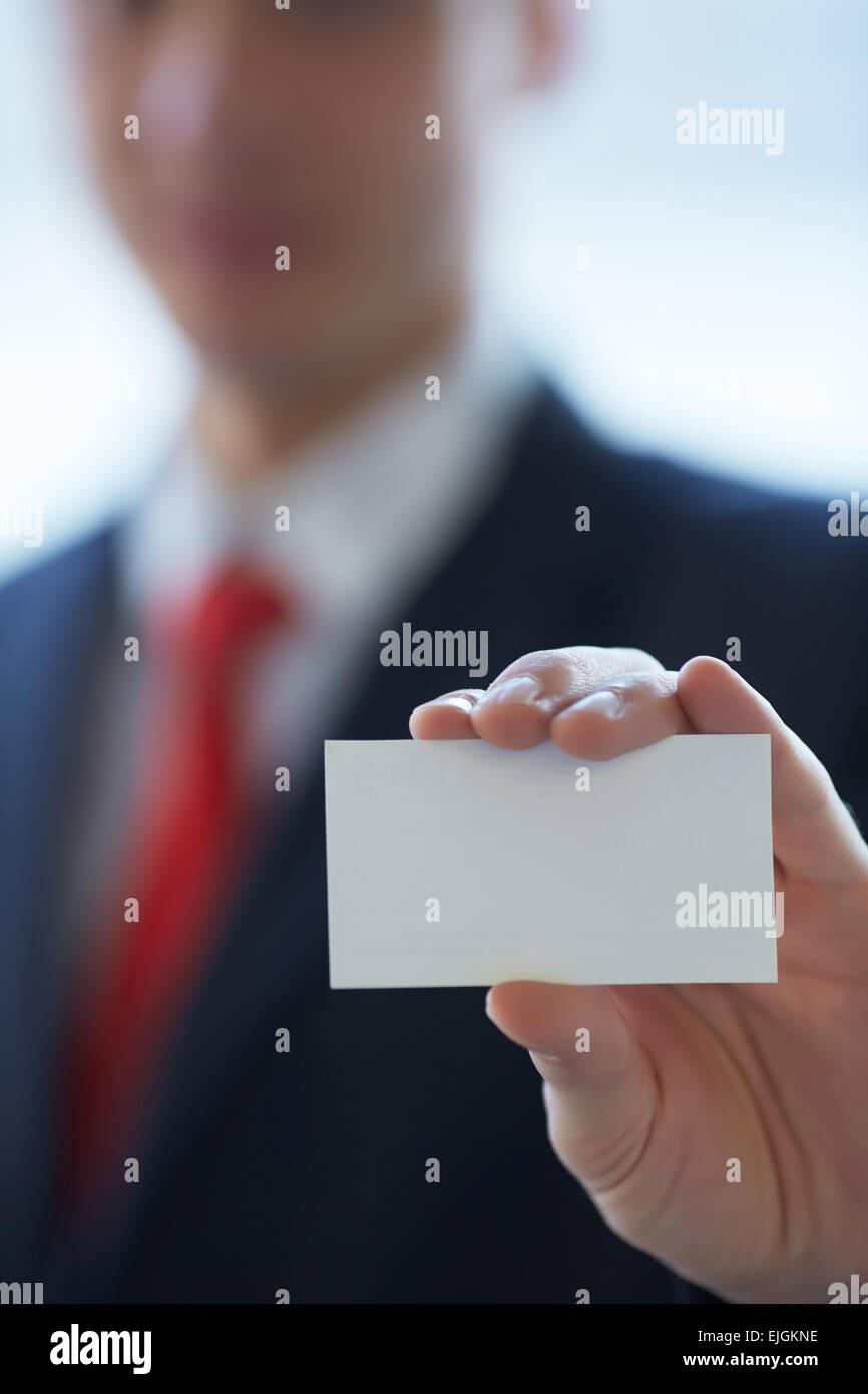 businessman giving a business card Stock Photo - Alamy