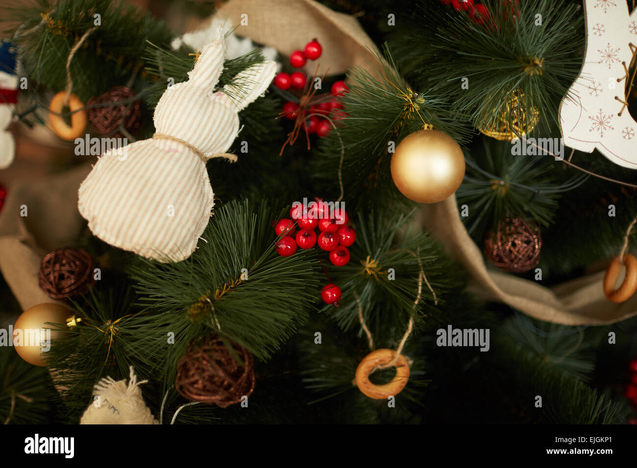 little rabbit hanging on a Christmas tree Stock Photo - Alamy