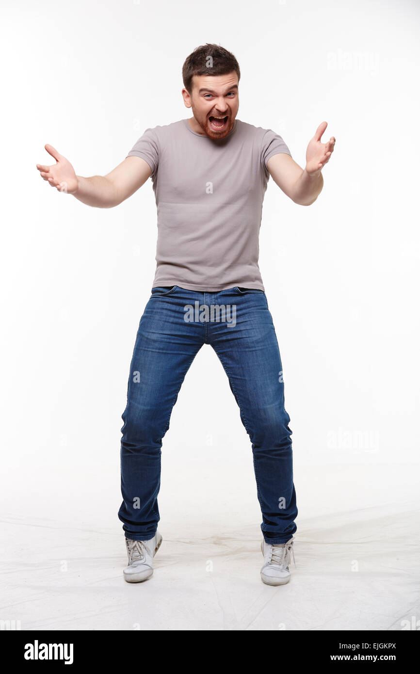 young man surprised, puzzled Stock Photo - Alamy