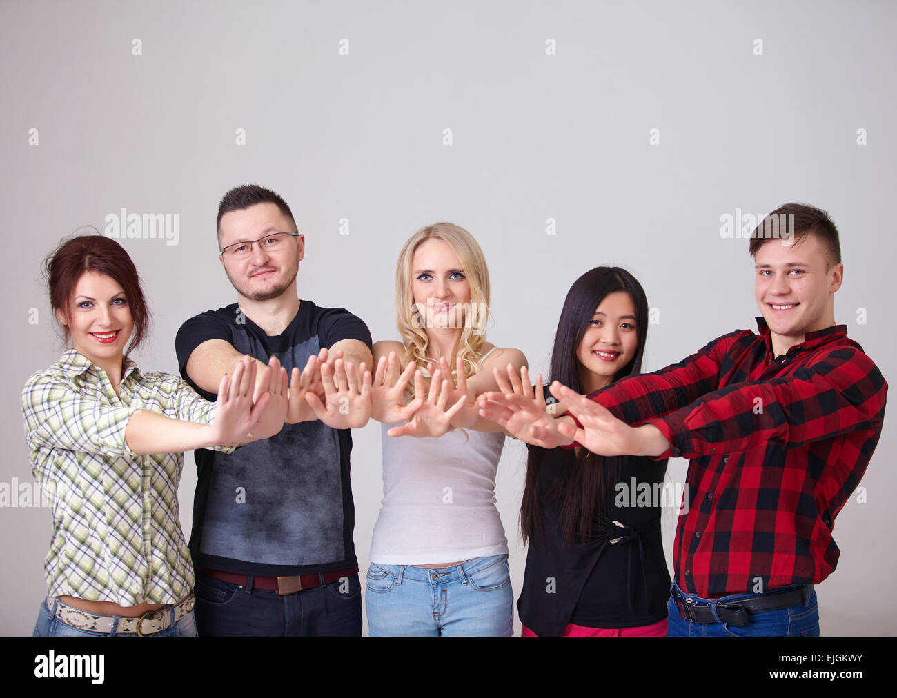 a group of young people, students stand together, show the palm Stock ...
