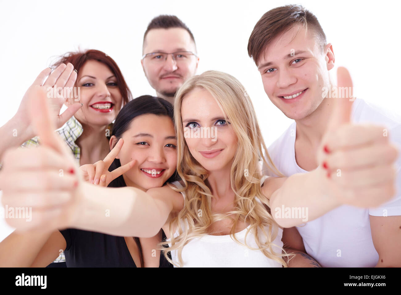 a group of students waving their hands Stock Photo - Alamy