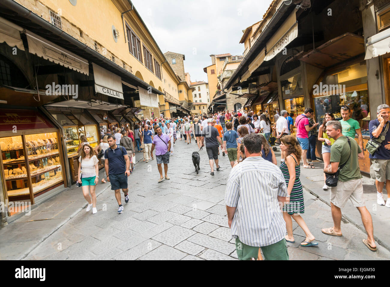 Florence,Italy-August 26,2014:Tourists stroll and shop among the many ...