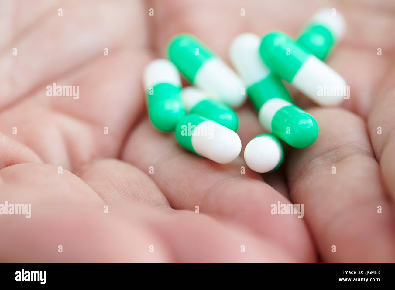 the doctor gave the patient medication capsules Stock Photo - Alamy