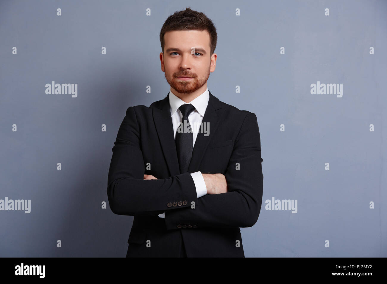 businessman in a suit smiling Stock Photo - Alamy