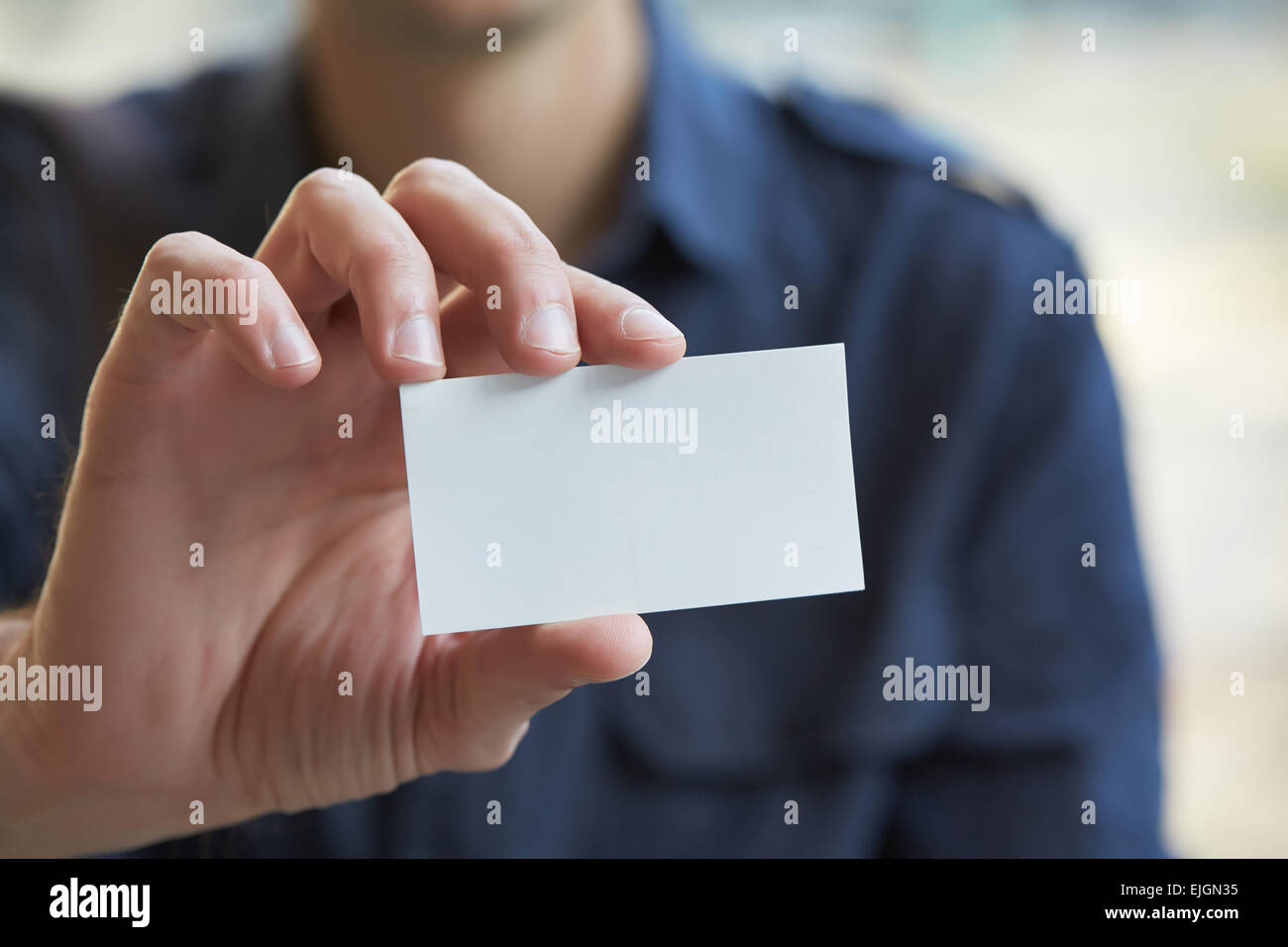 businessman giving a business card Stock Photo - Alamy