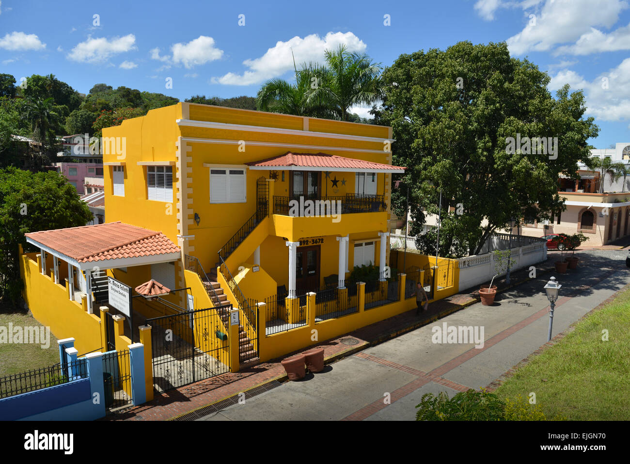 View of a yellow house in the bucolic town of San German, Puerto Rico ...