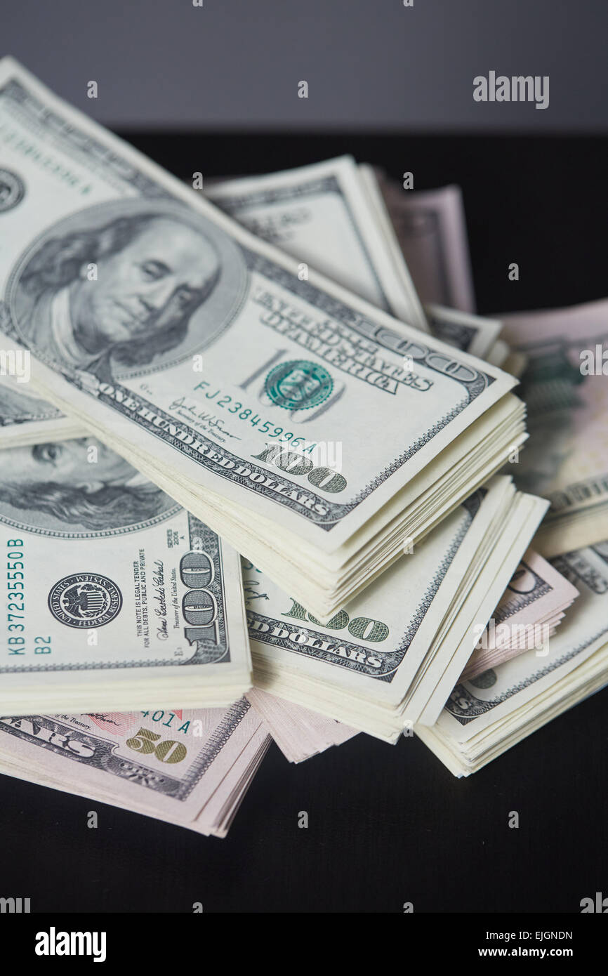 money on the table in a chaotic manner Stock Photo - Alamy