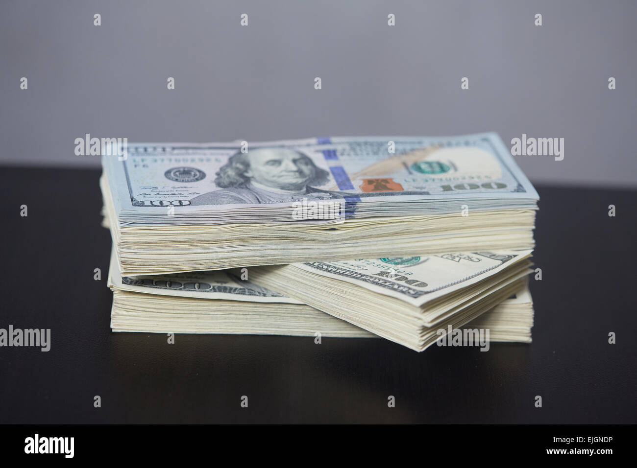 stacks of money Stock Photo - Alamy
