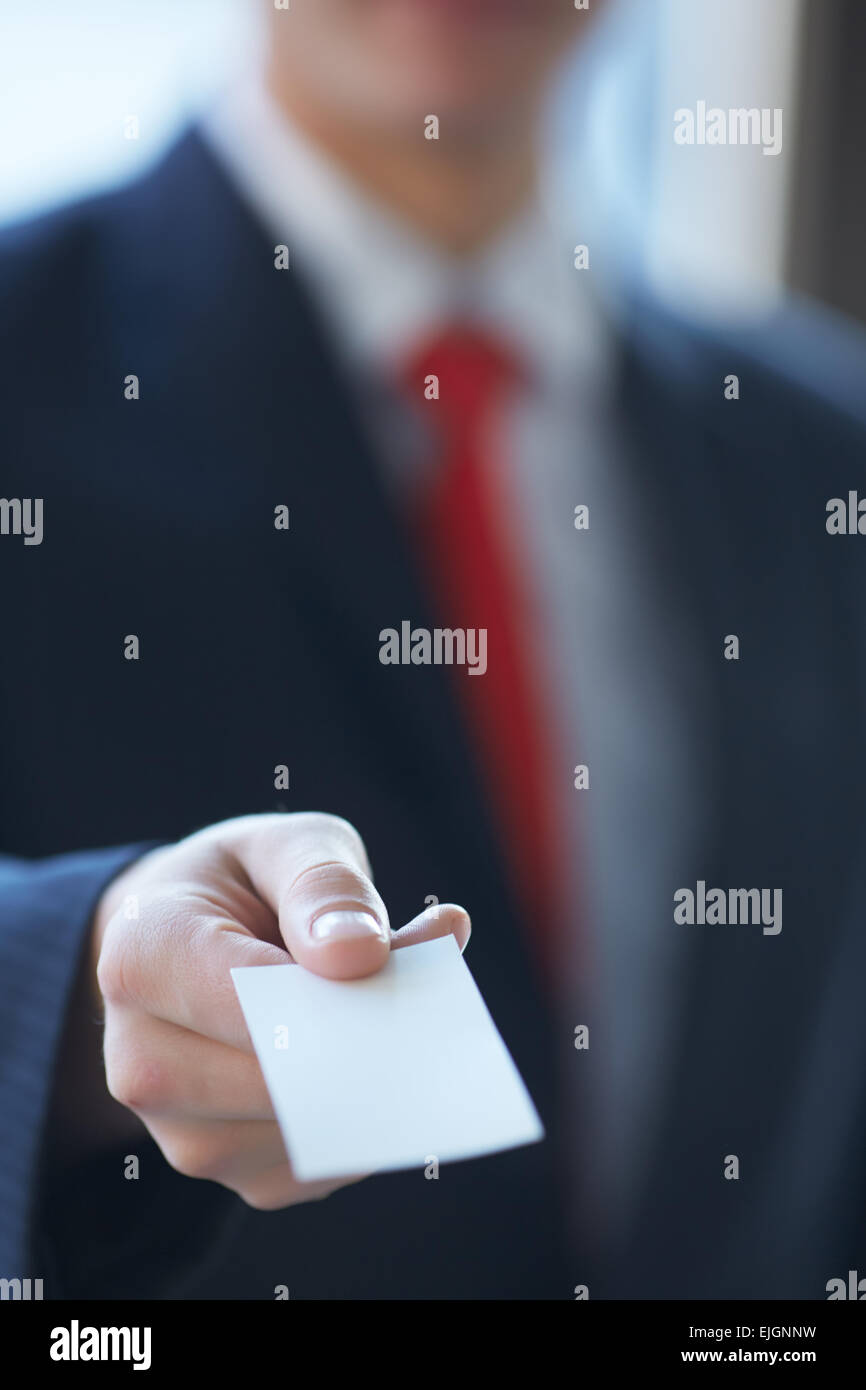 businessman giving a business card Stock Photo - Alamy