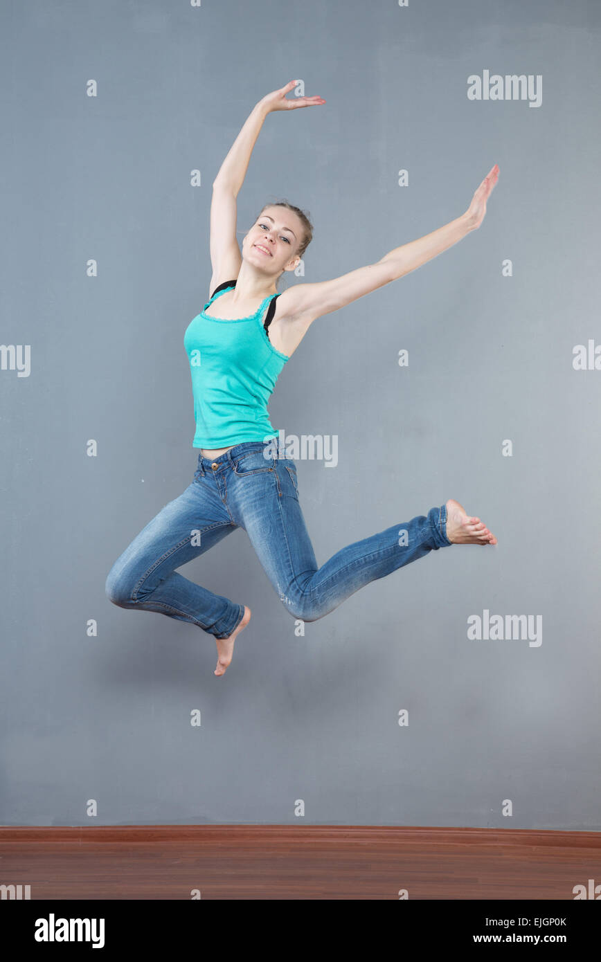 Girl jumping high, isolated on white Stock Photo - Alamy