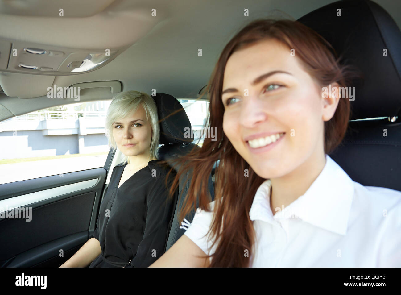 two girls in the car Stock Photo - Alamy