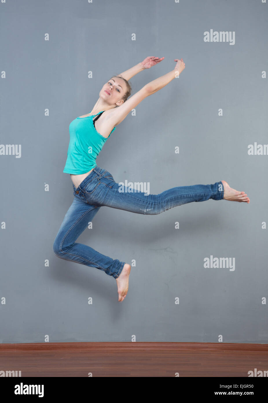 Girl jumping high, isolated on white Stock Photo - Alamy