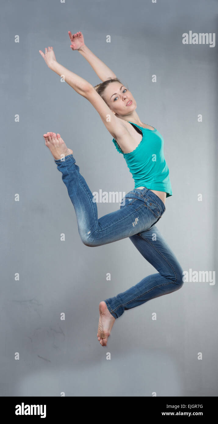 Girl jumping high, isolated on white Stock Photo - Alamy