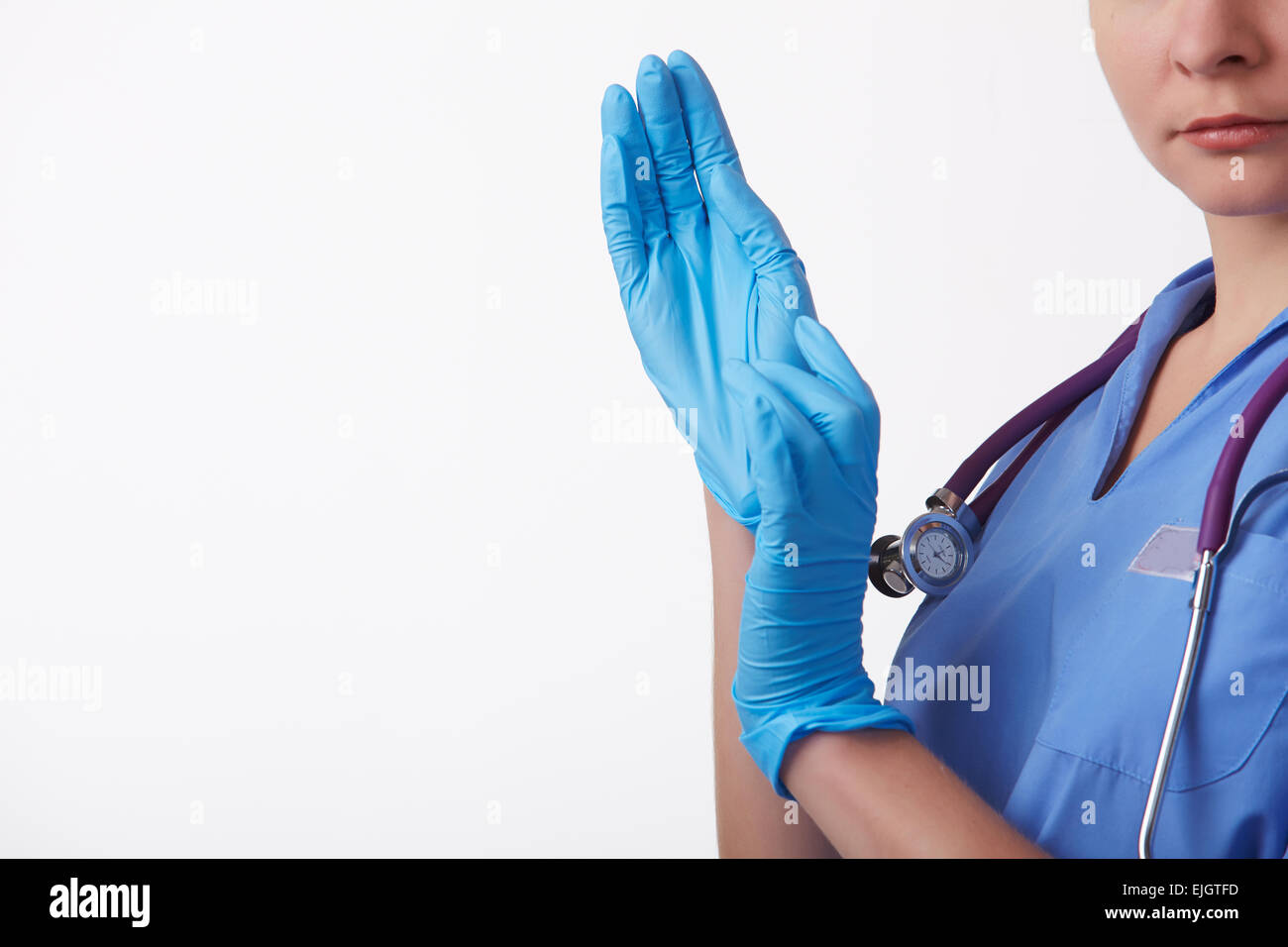 doctor wears gloves Stock Photo - Alamy