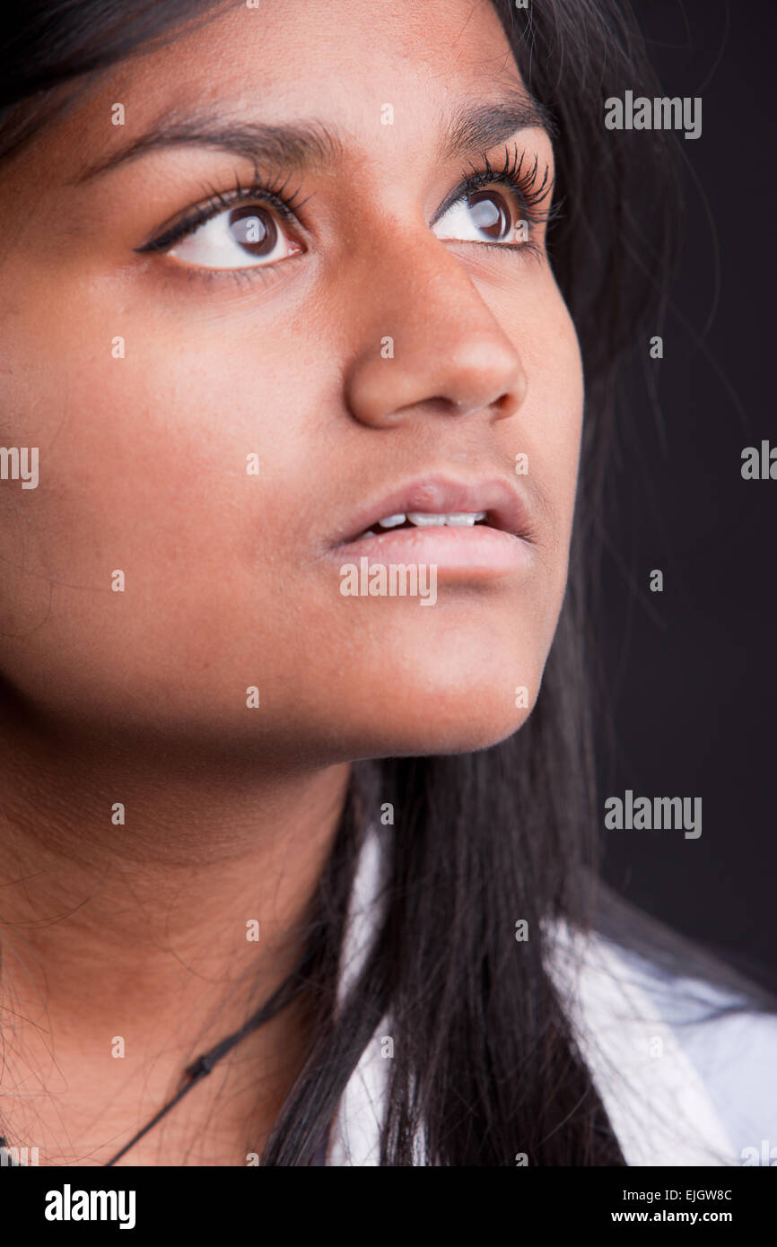 portrait of a beautiful indian girl thinking or looking Stock Photo - Alamy