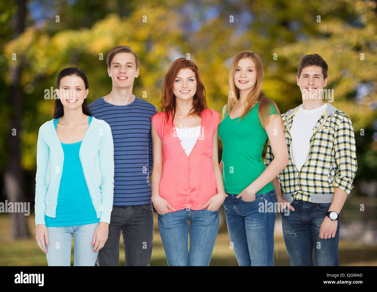 group of smiling students standing Stock Photo - Alamy