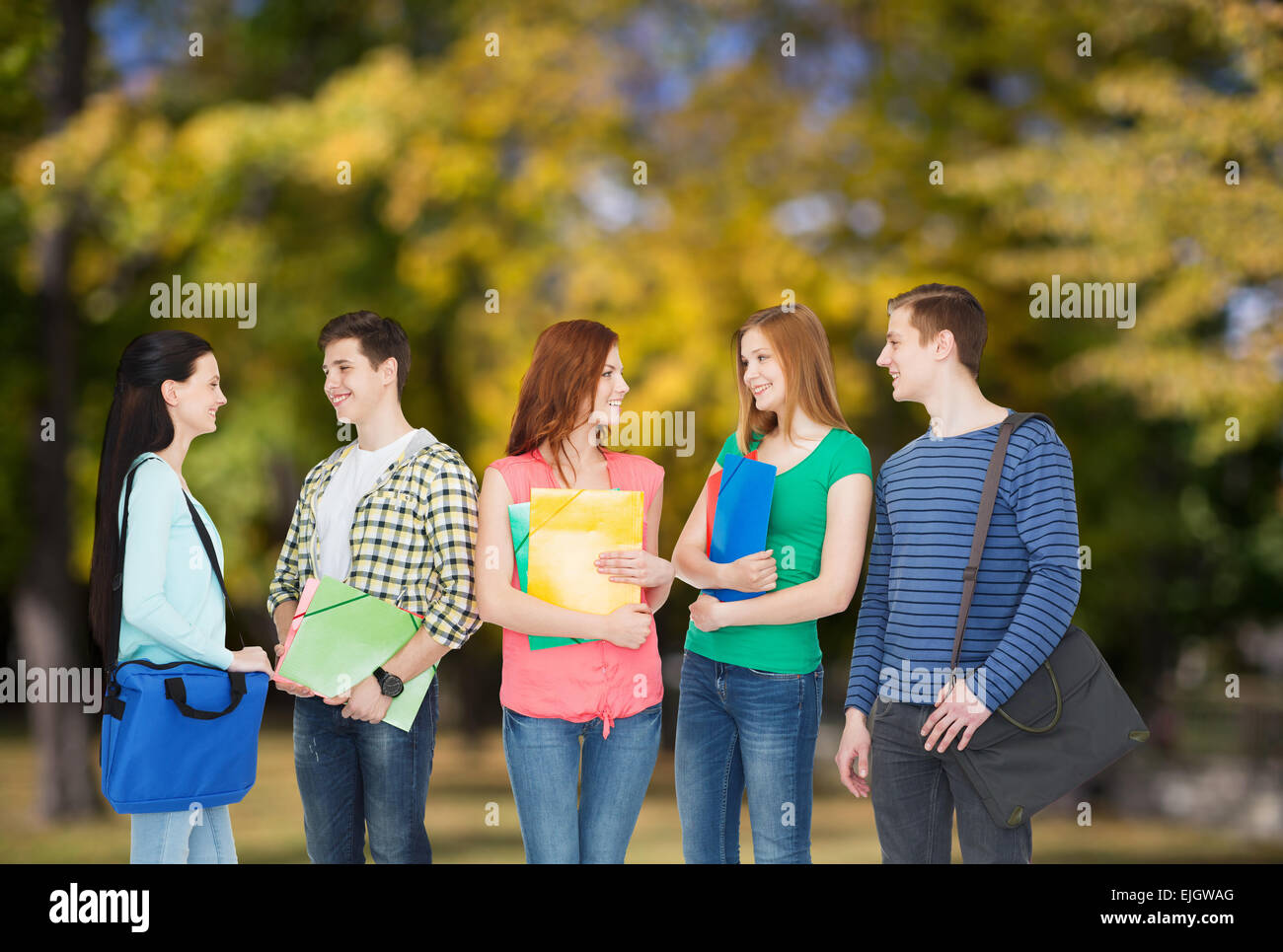 group of smiling students standing Stock Photo - Alamy