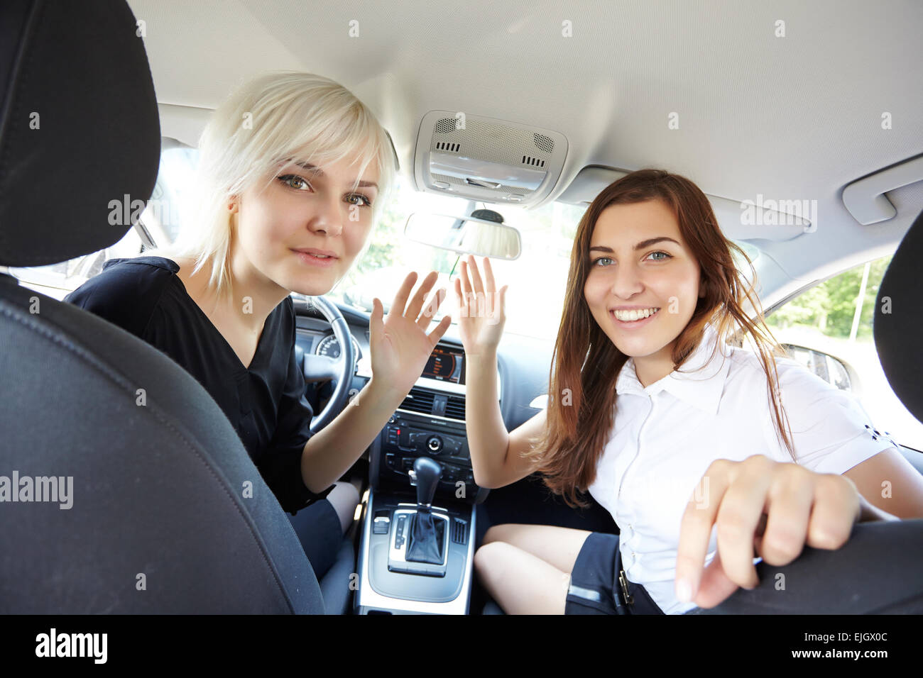 two girls in the car Stock Photo - Alamy