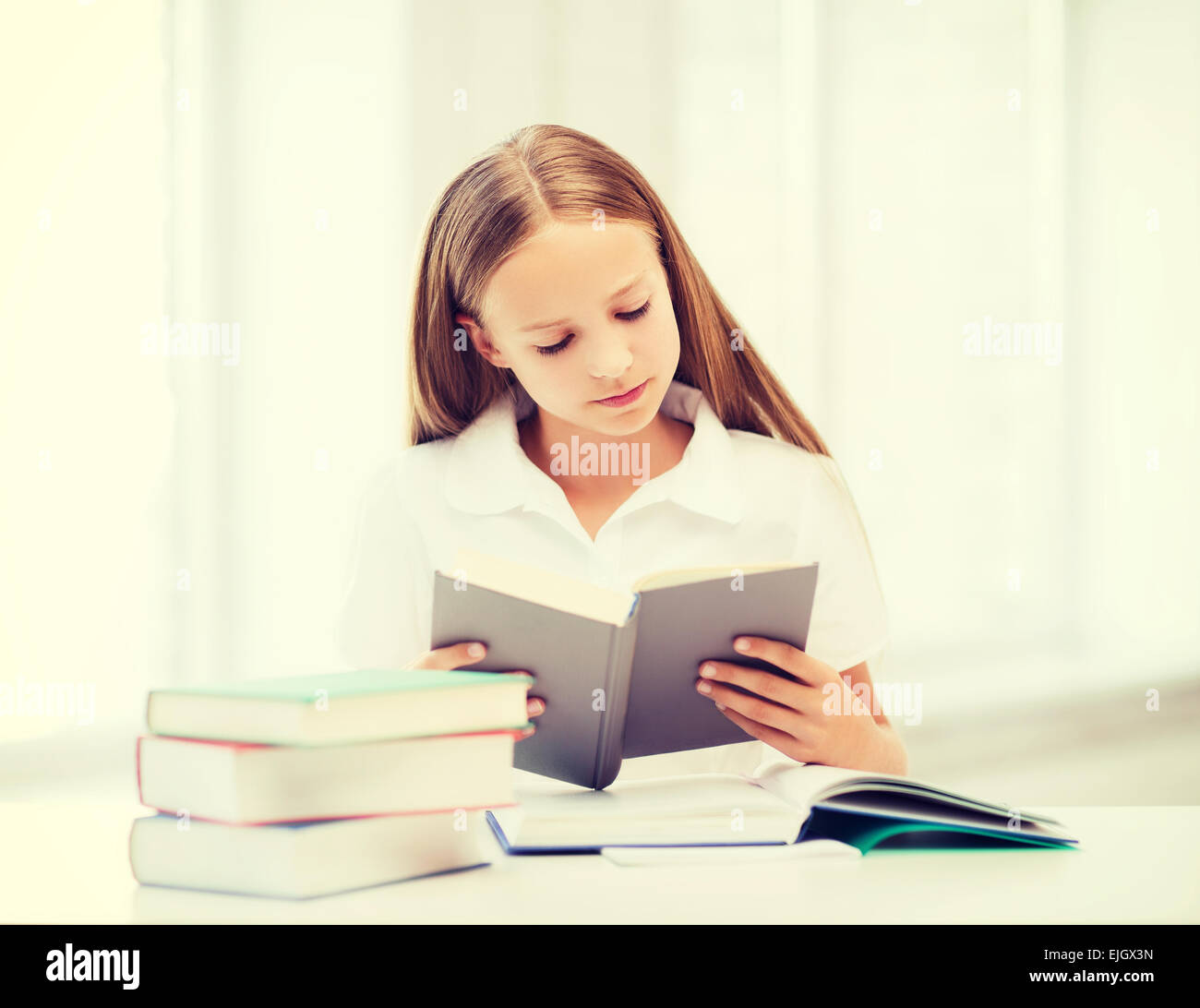 student girl studying at school Stock Photo - Alamy