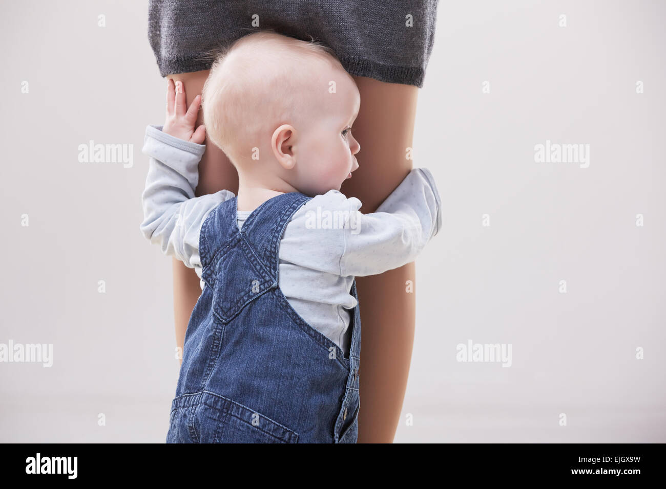 baby between the legs of mom Stock Photo - Alamy