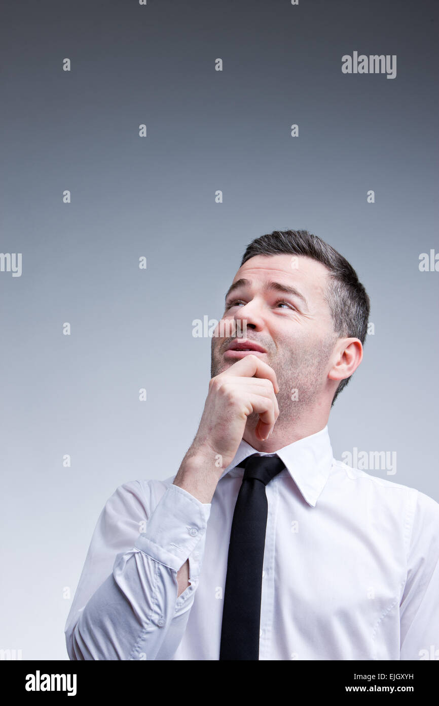 business man evaluating problems and solutions Stock Photo - Alamy