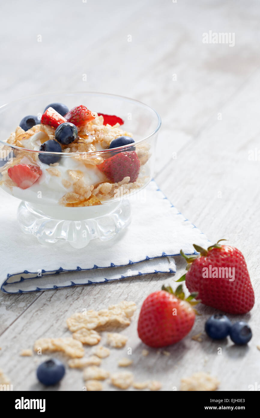 close up view of nice fresh yummy parfait on color back Stock Photo - Alamy