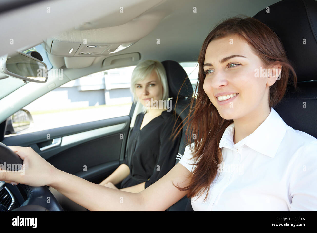two girls in the car Stock Photo - Alamy