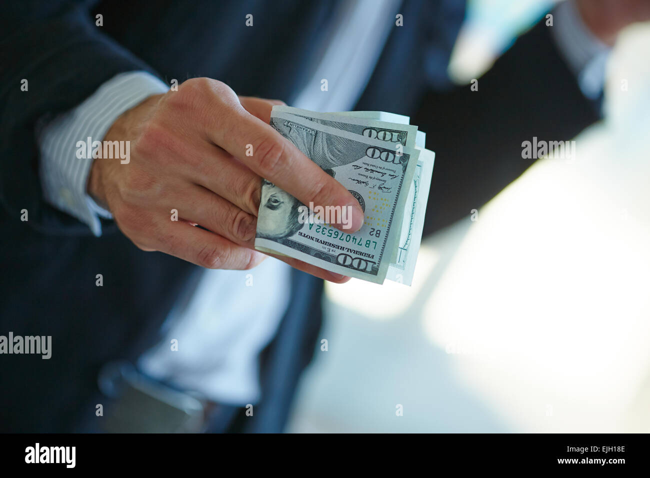Dollars in hands money hi-res stock photography and images - Alamy