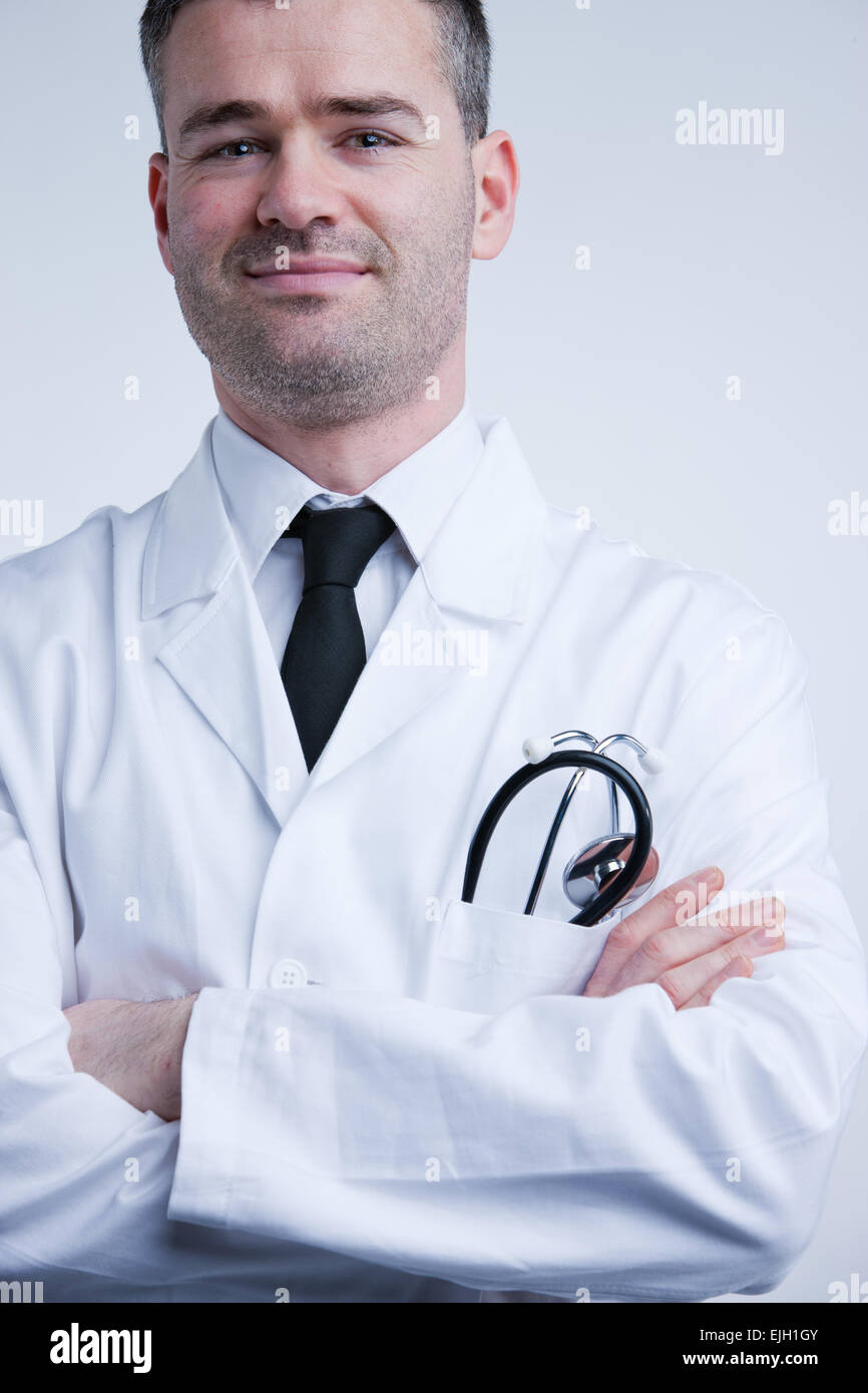 self confident reassuring doctor in white coat ready to serve Stock ...