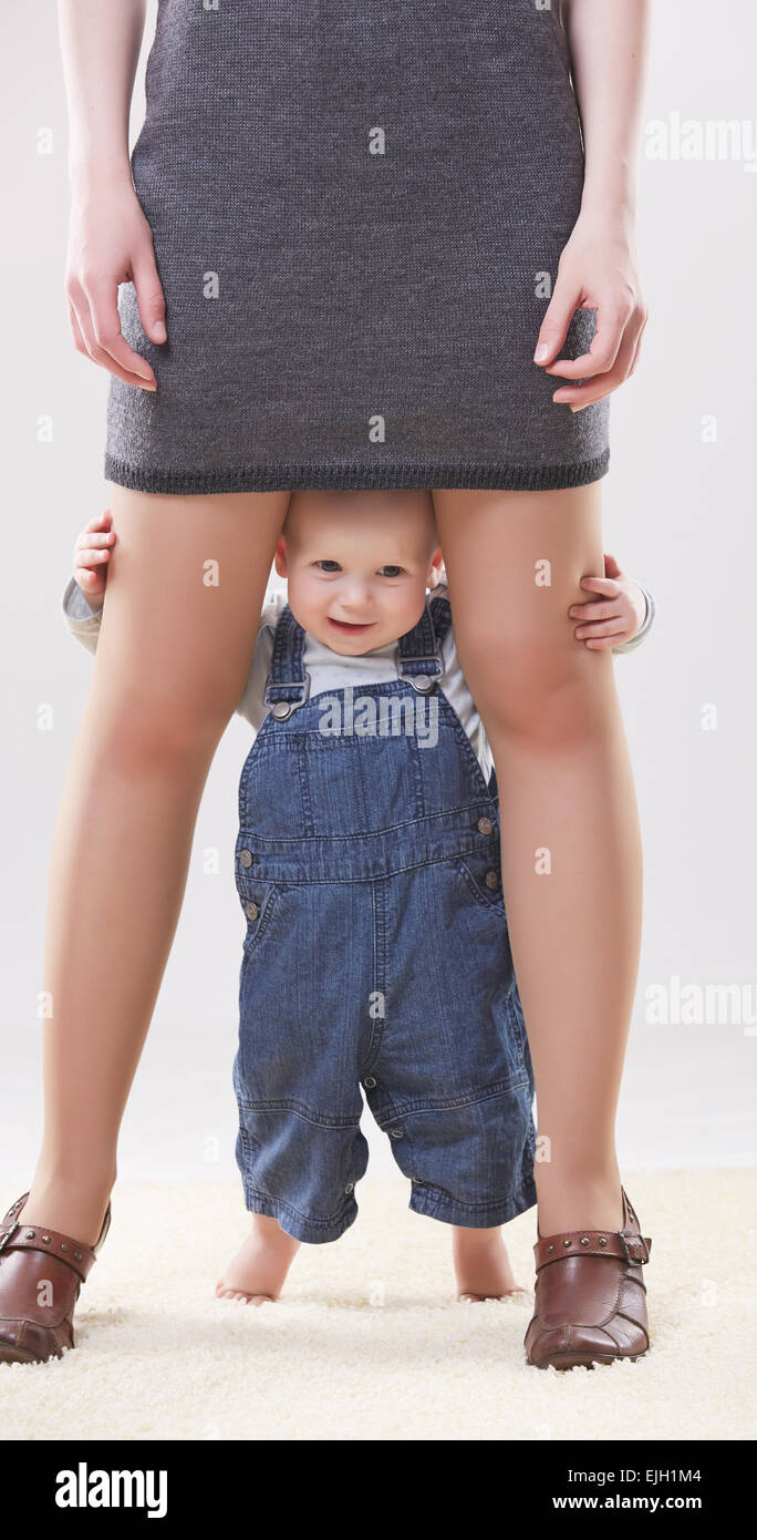 Baby between legs mom hi-res stock photography and images - Alamy