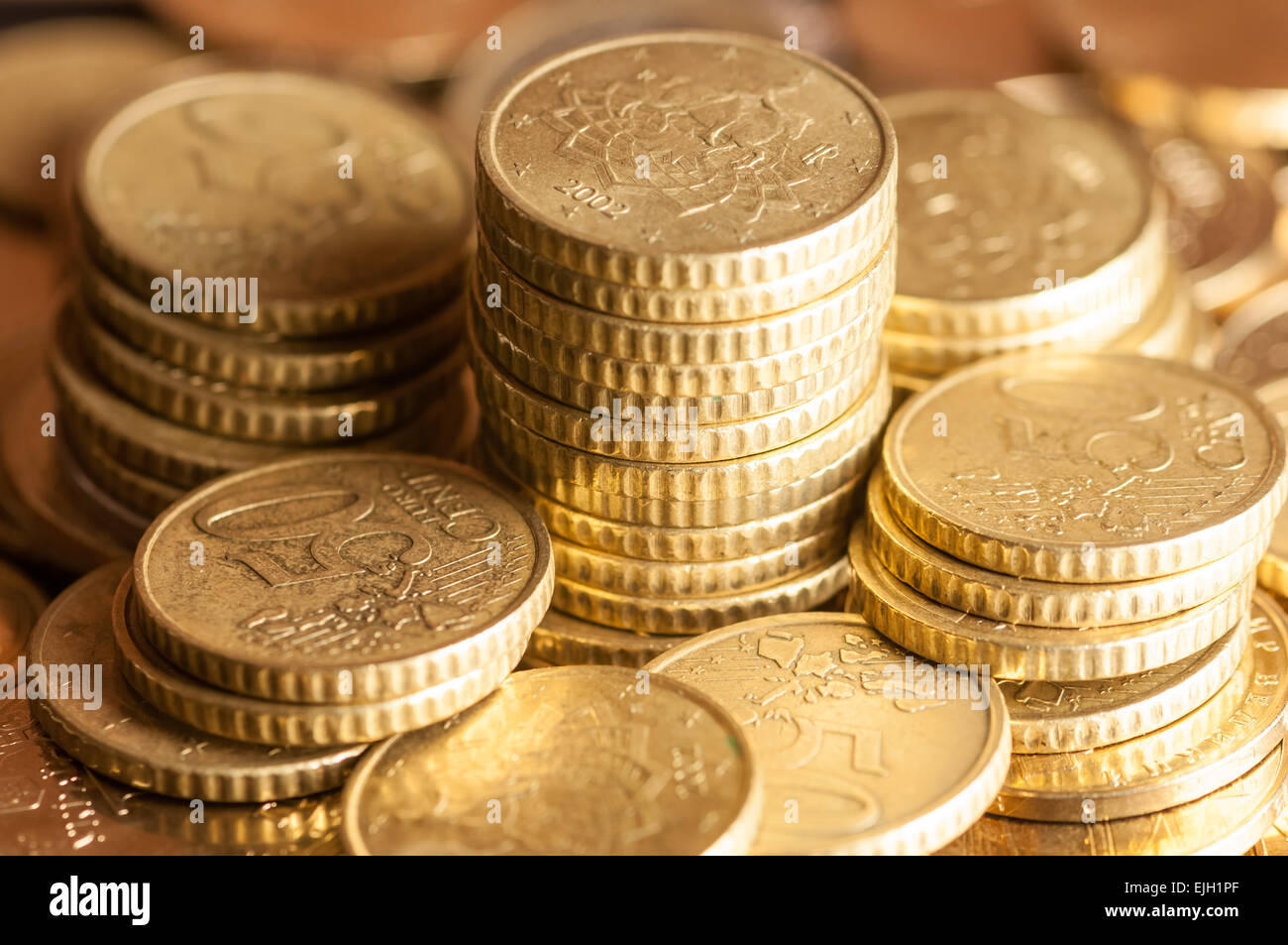 gold identical coin close up Stock Photo - Alamy