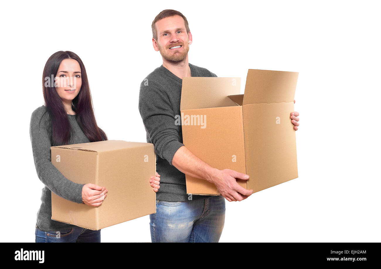 Couple with moving boxes Stock Photo - Alamy