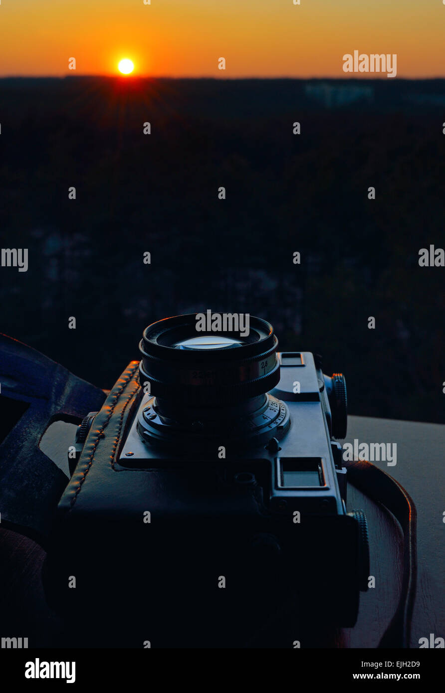 Old camera at sunset Stock Photo - Alamy