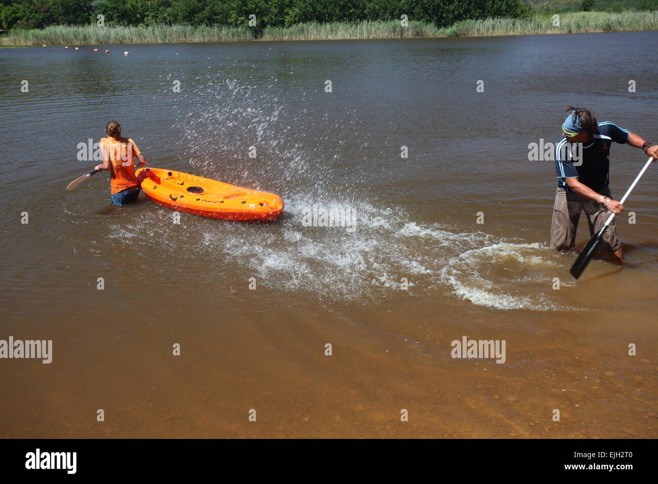 Playfully splashing hi-res stock photography and images - Alamy