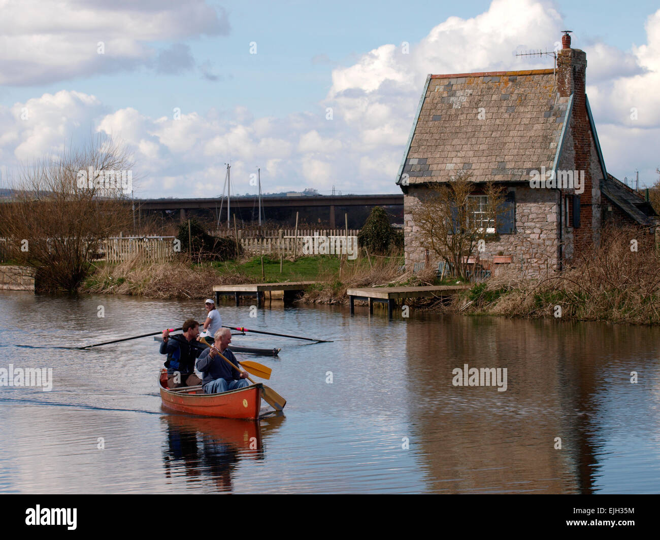 Boating on the Exeter Canal near the Topsham Ferry point and Topsham ...