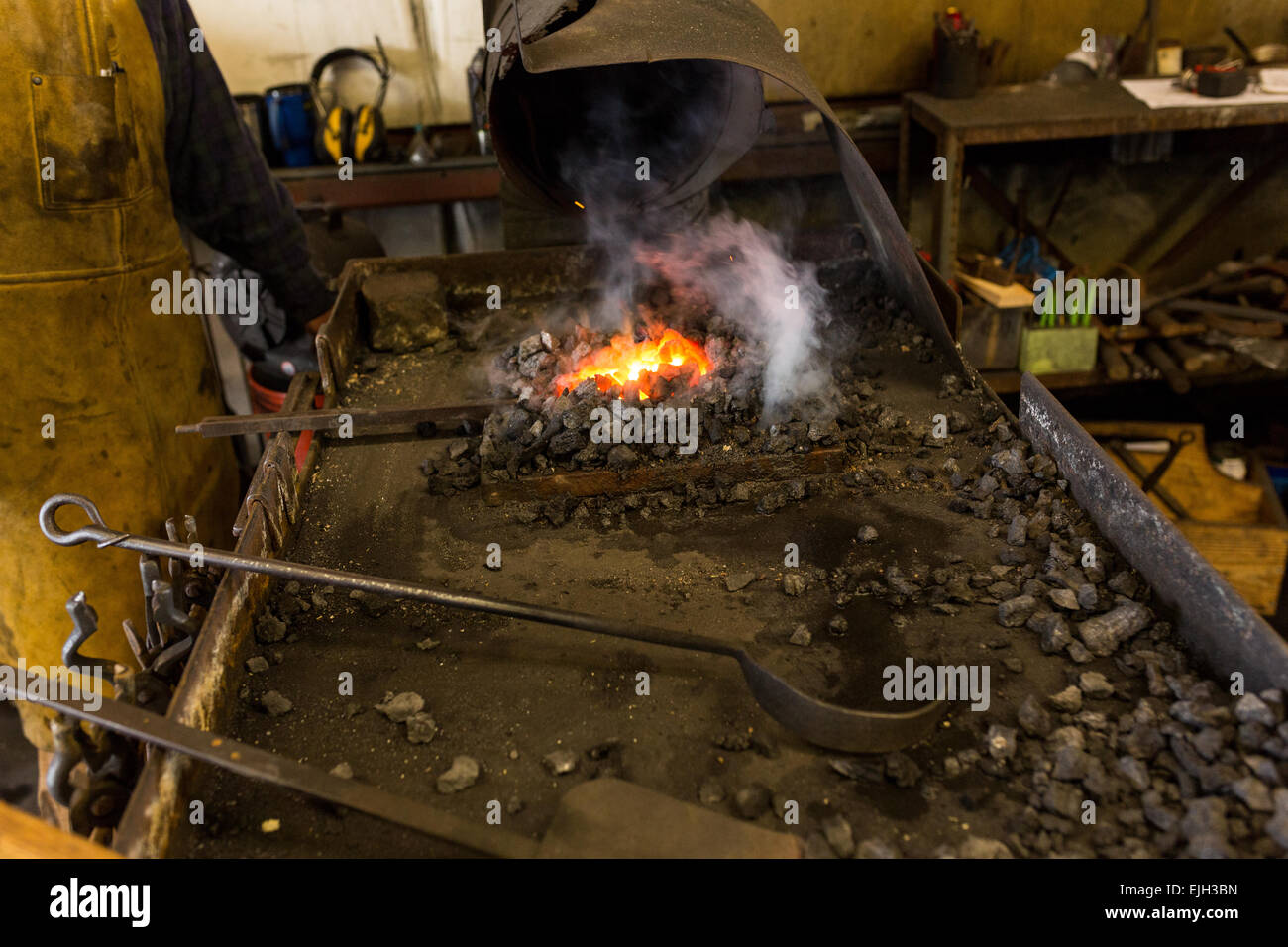 A blacksmith forge and metal working tools at a iron working shop in ...