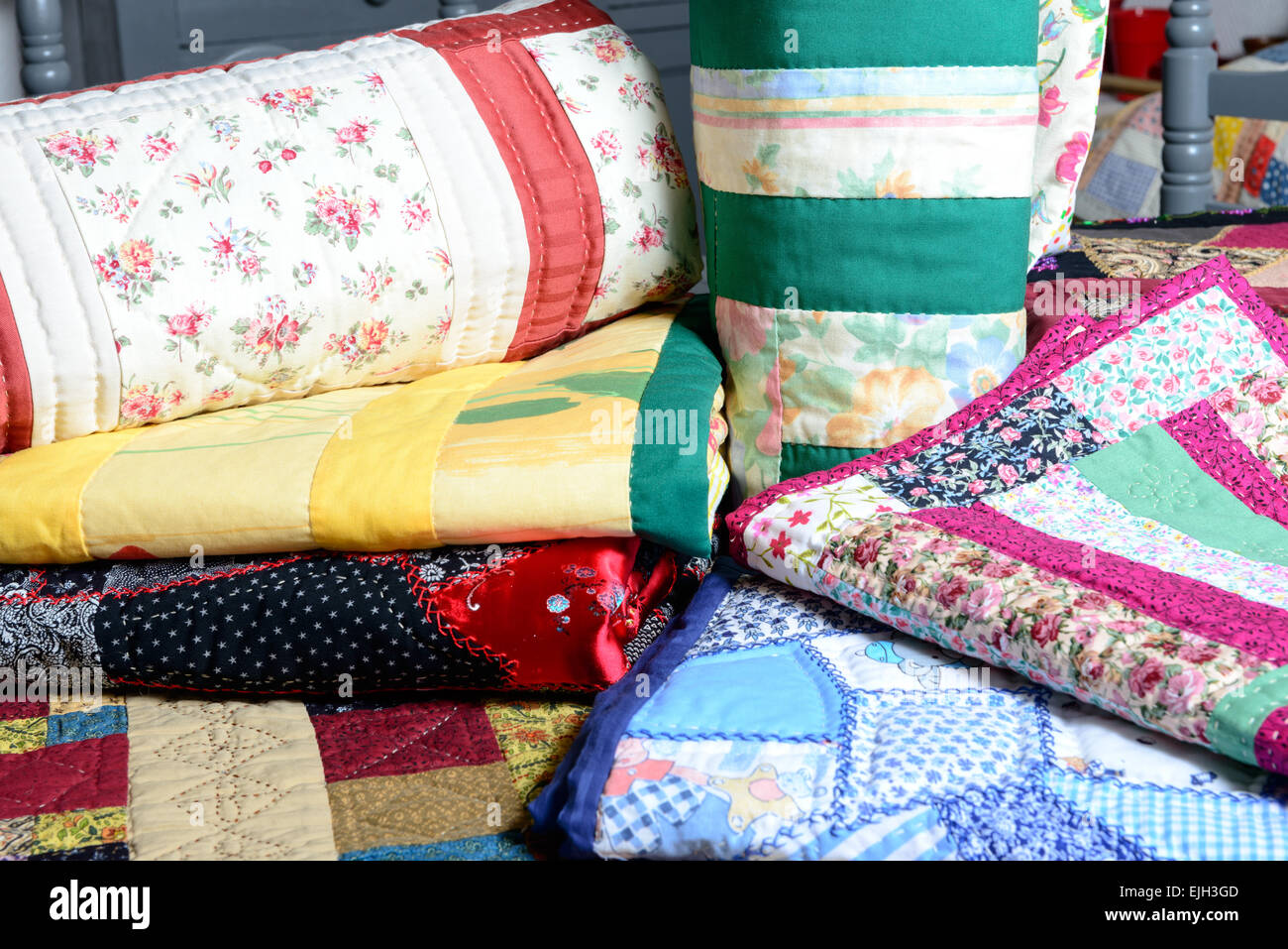 different colored patchwork stacked on a table Stock Photo - Alamy