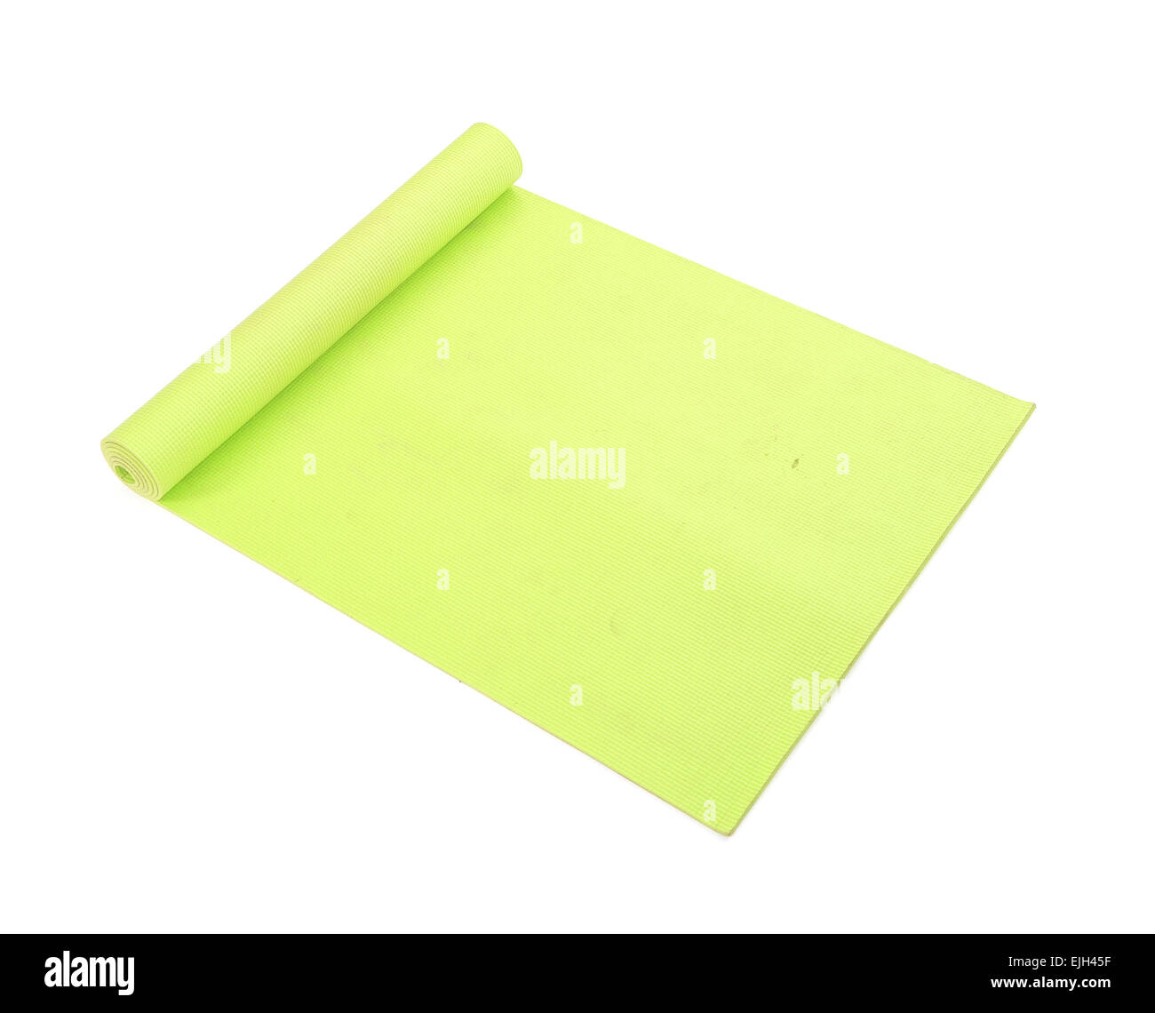 green yoga mat on a white background Stock Photo - Alamy