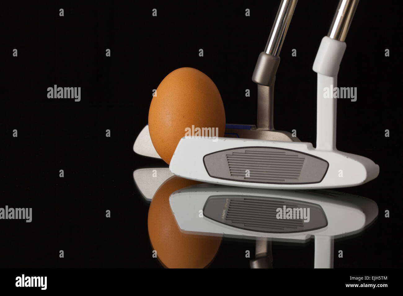 Two putters hi-res stock photography and images - Alamy