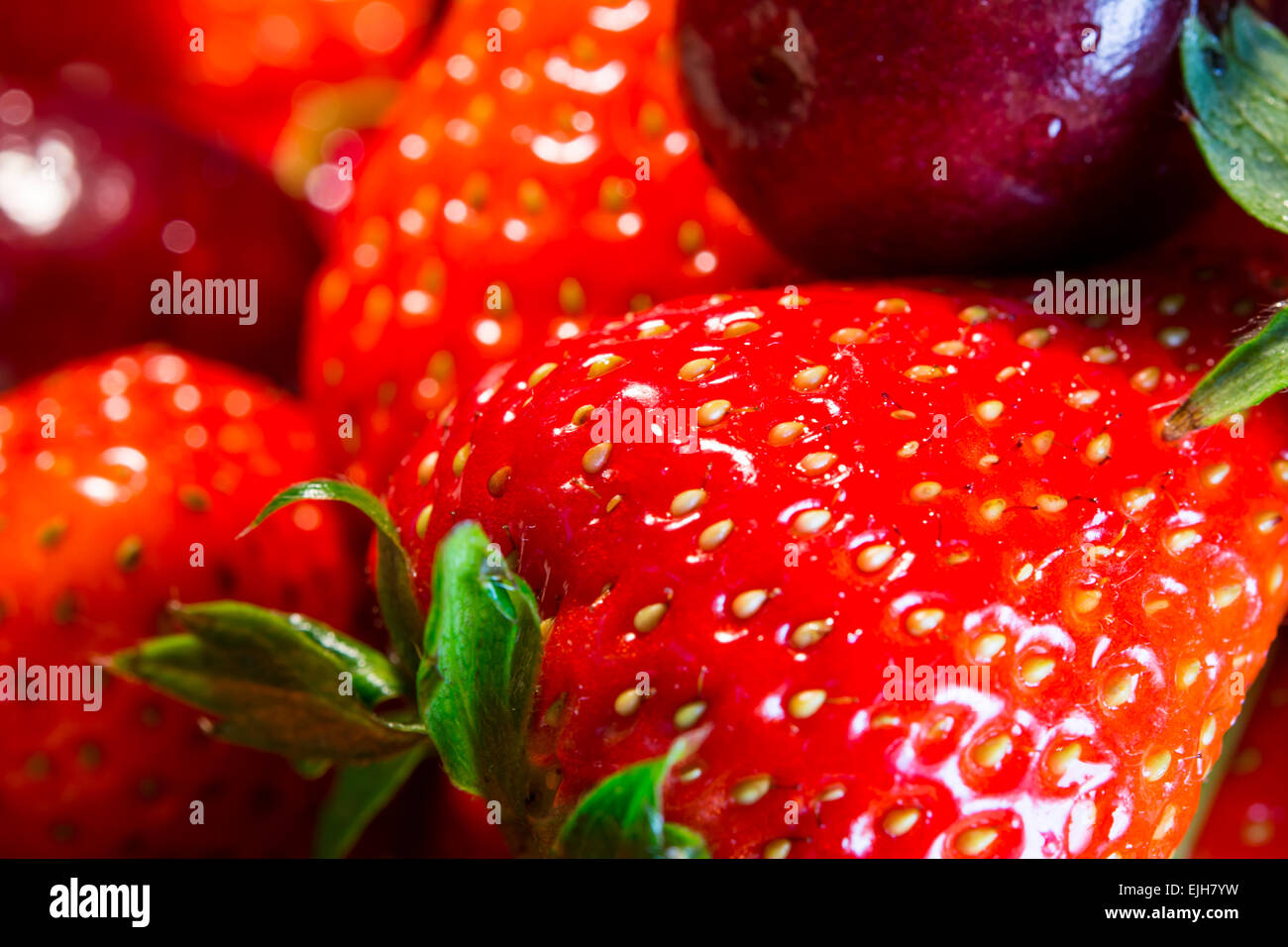 strawberry and cherry Stock Photo - Alamy