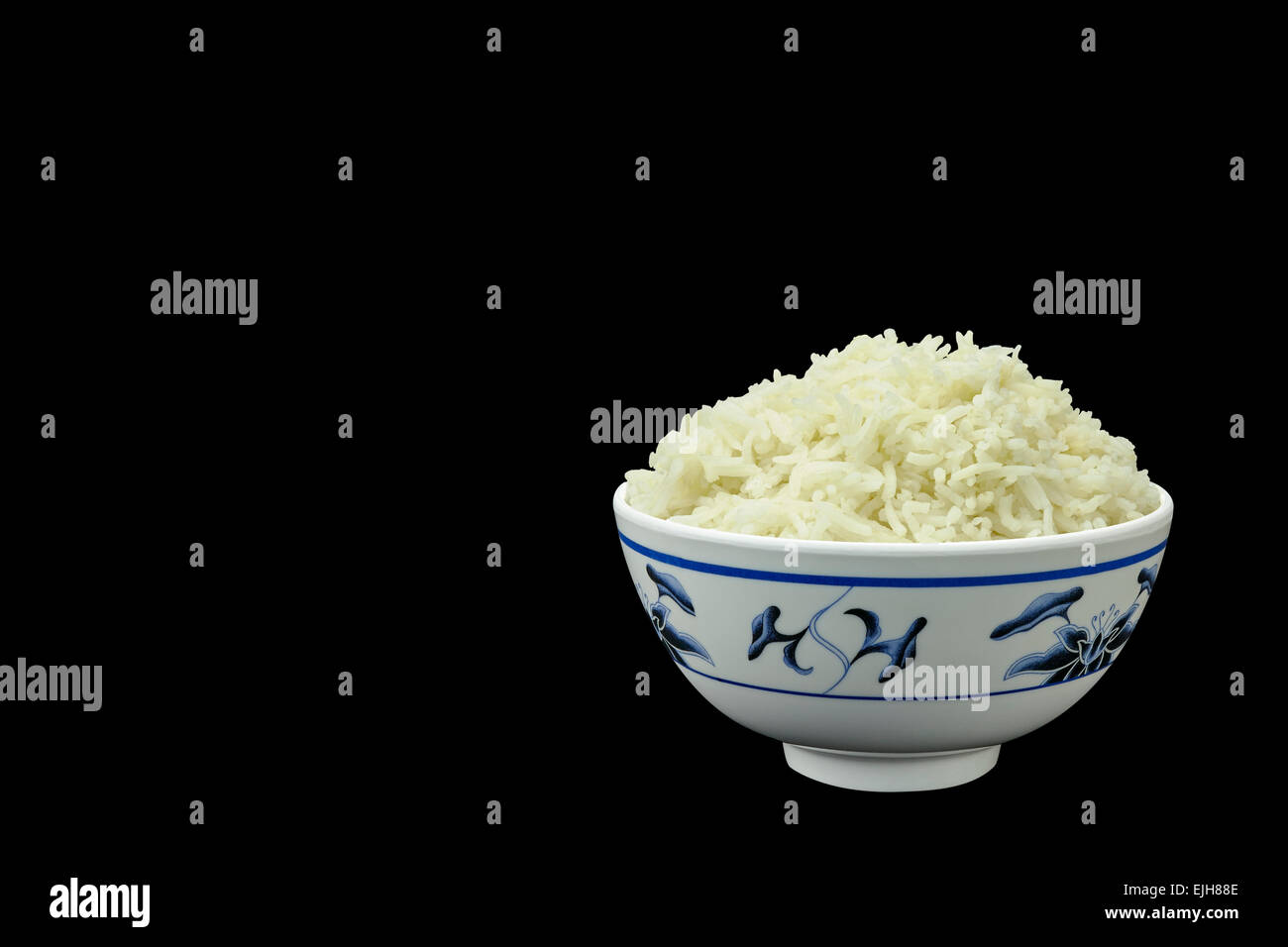 Organic natural cooked rice in asian bowl isolated on black background ...