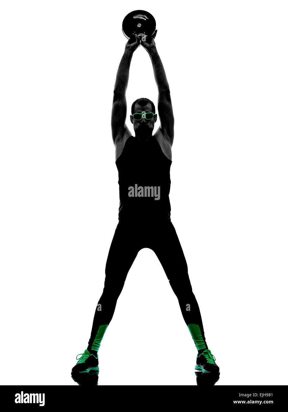 one man exercising weight disk fitness crossfit in silhouette isolated ...