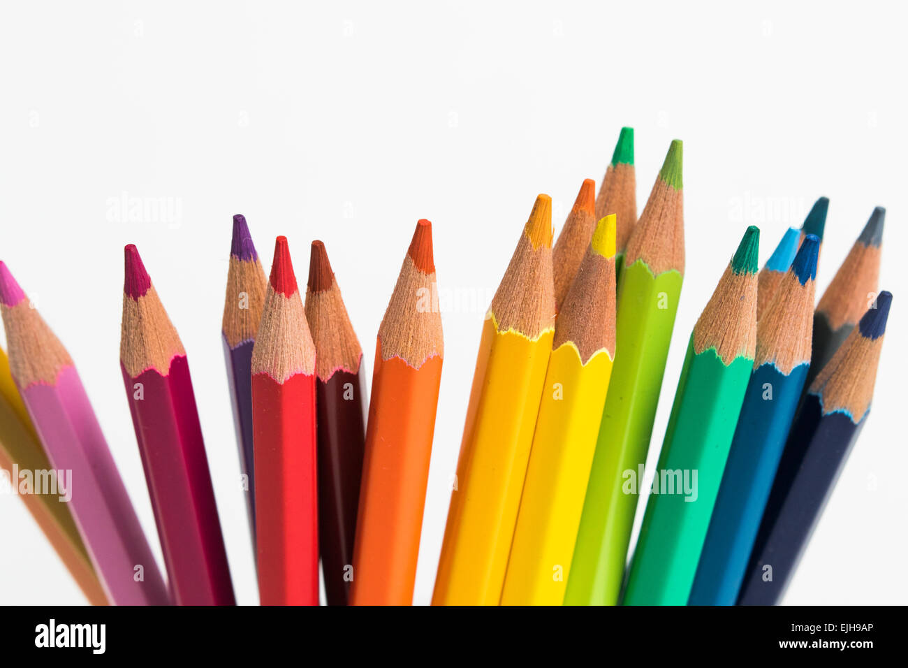 A group of rainbow colored pencils on an isolated background Stock ...