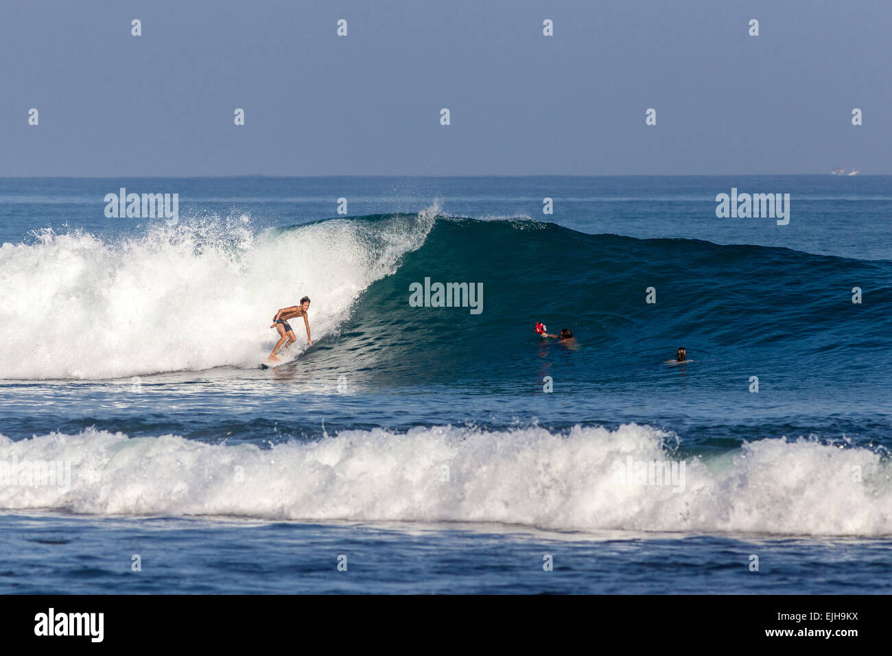 Surfing at Bingin beach,Bali Stock Photo - Alamy
