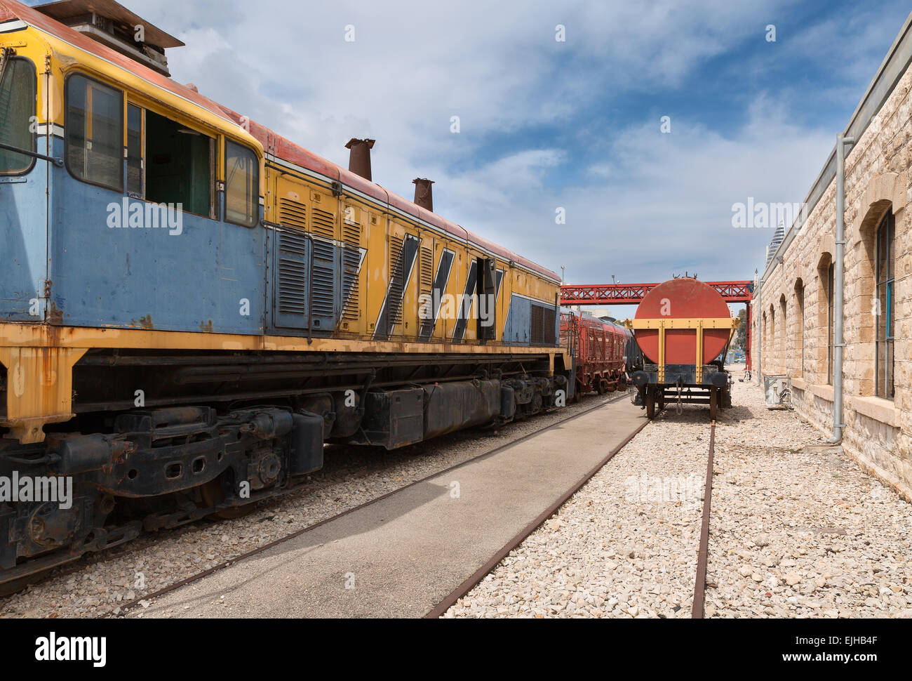 old yellow diesel locomotive close up Stock Photo - Alamy
