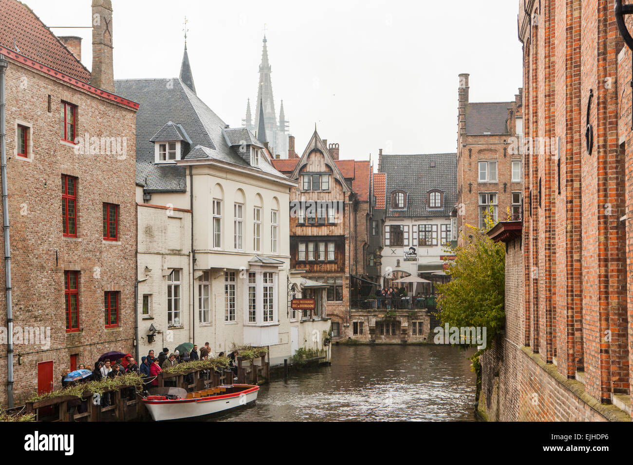Canal boat tour in Bruges, Belgium Stock Photo - Alamy