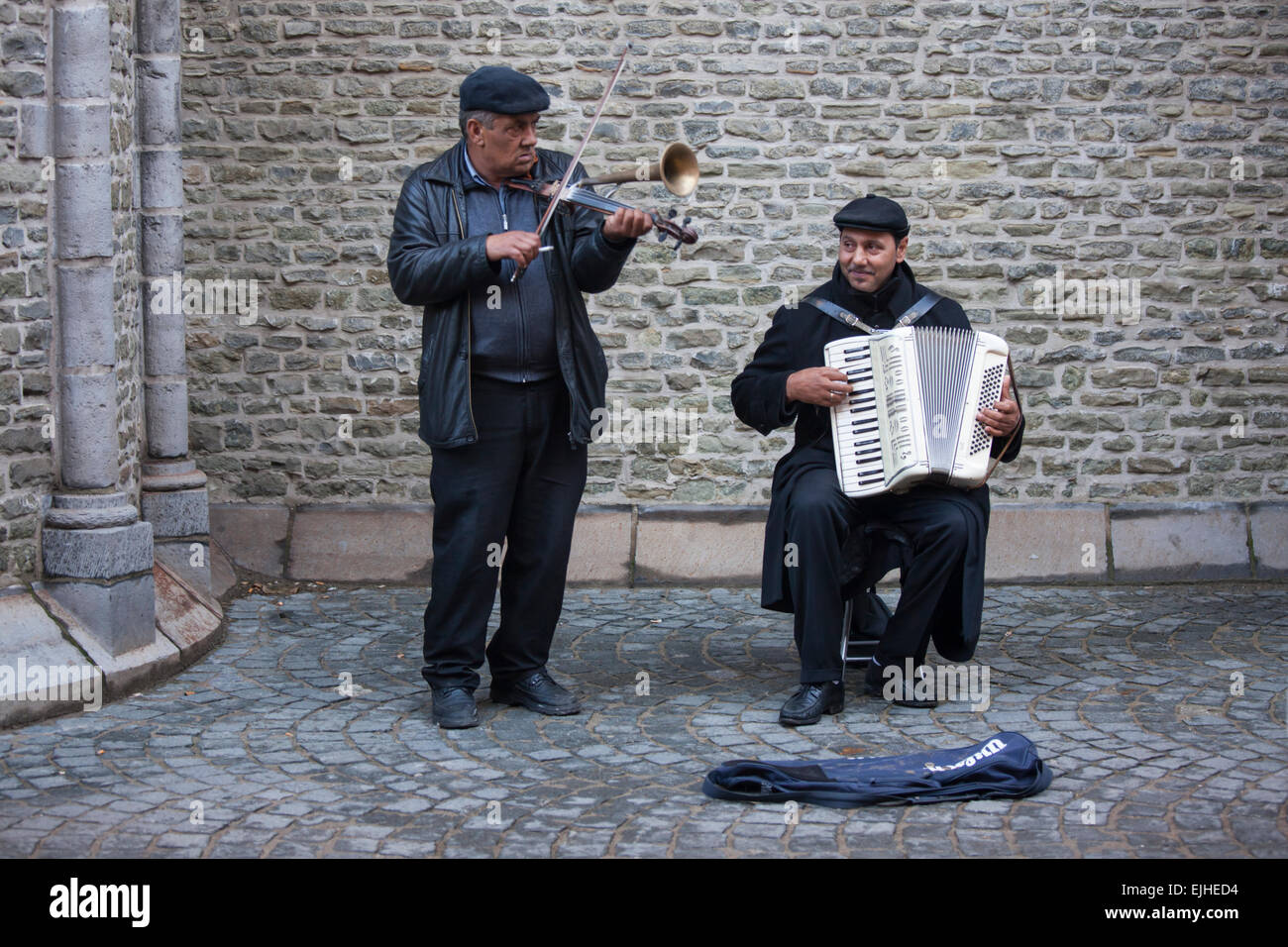 Immigrant street musicians, Bruges, Belgium Stock Photo - Alamy
