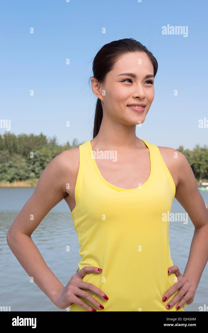 Portrait of young woman exercising Stock Photo - Alamy Portrait of young woman exercising Stock Photo - Alamy