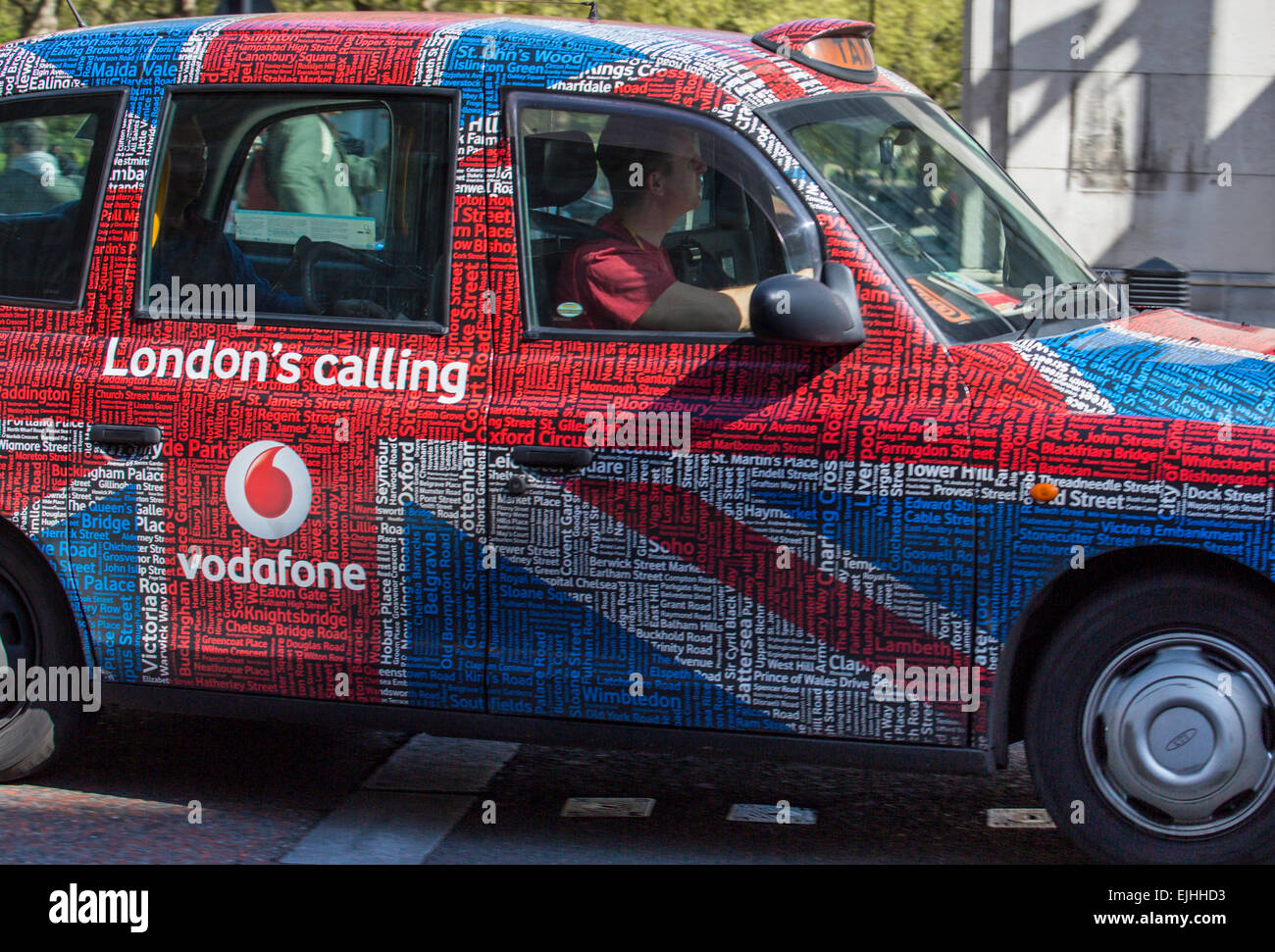 London cab with advertising, London, England Stock Photo - Alamy
